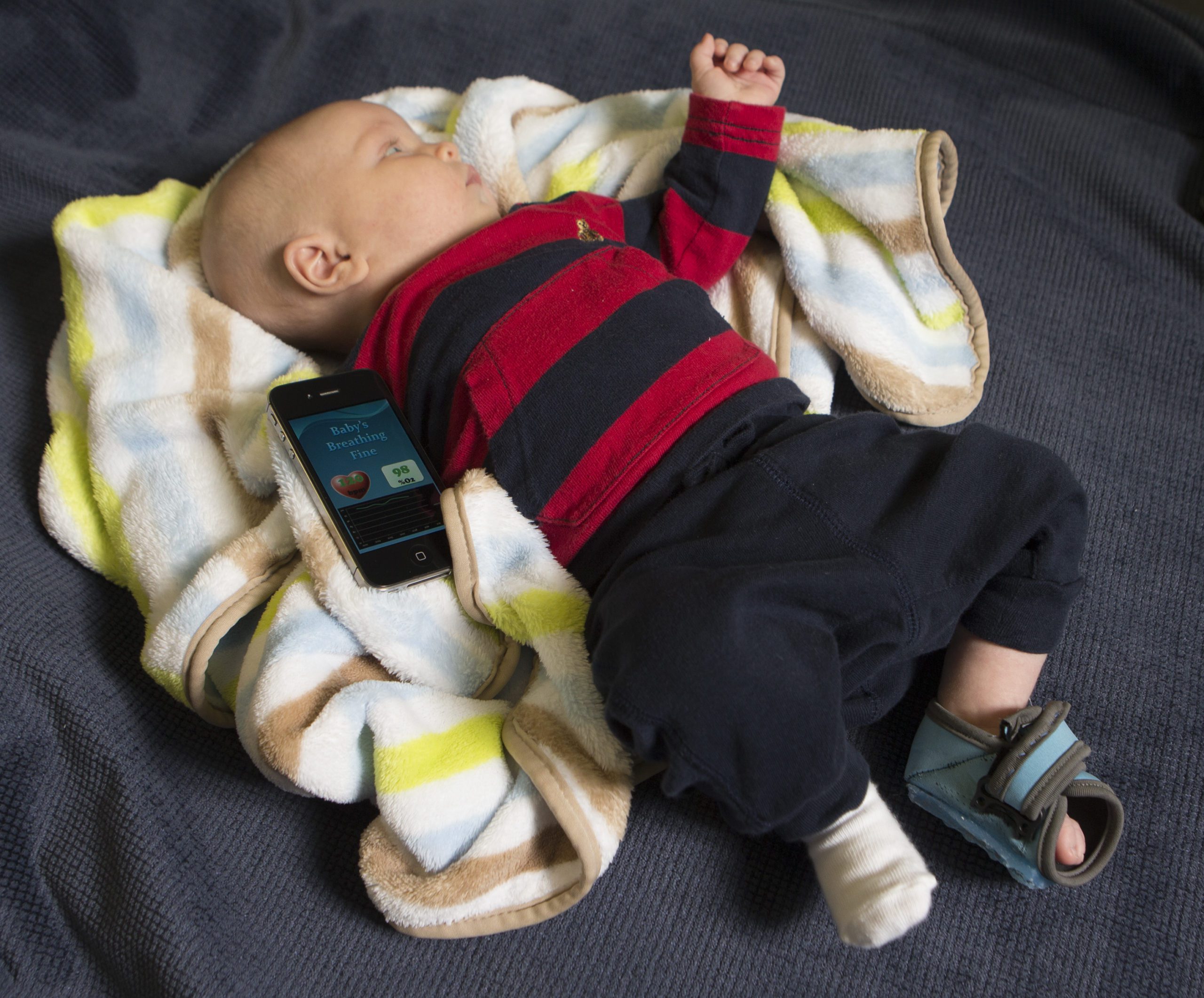 Baby with phone | Montessori Foundation | MFA | IMC
